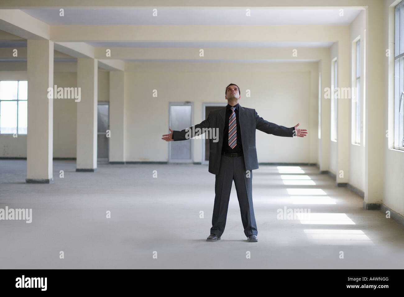 Man in suit praying looking hi-res stock photography and images - Alamy