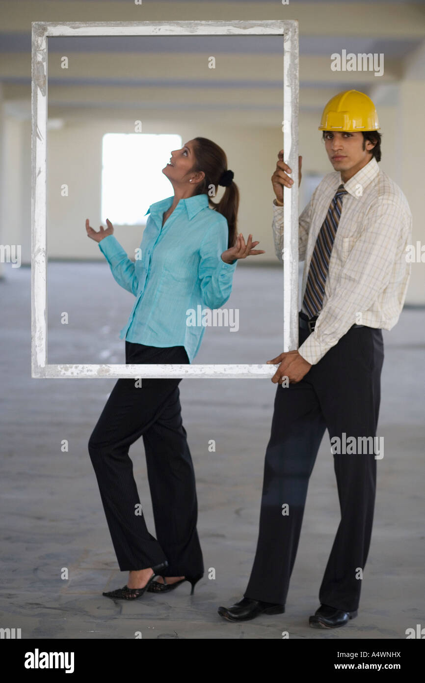 Man carrying empty frame hi-res stock photography and images - Alamy