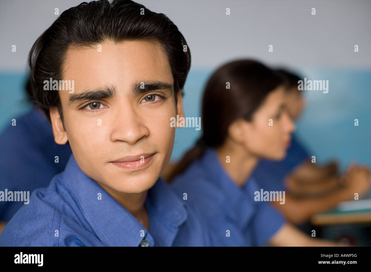 Male student looking at camera Stock Photo - Alamy