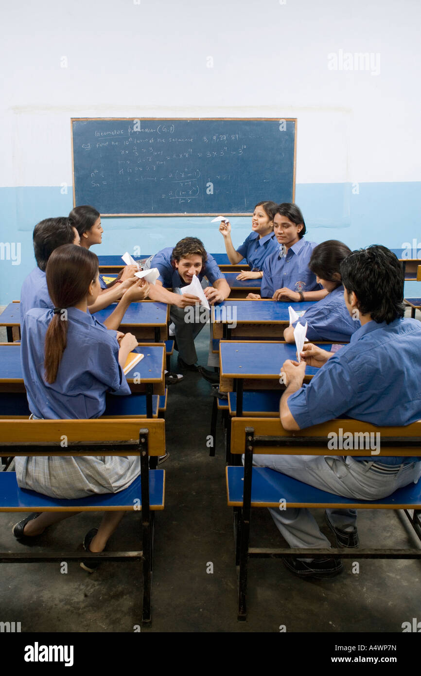 Students paper airplane classroom hi-res stock photography and images ...