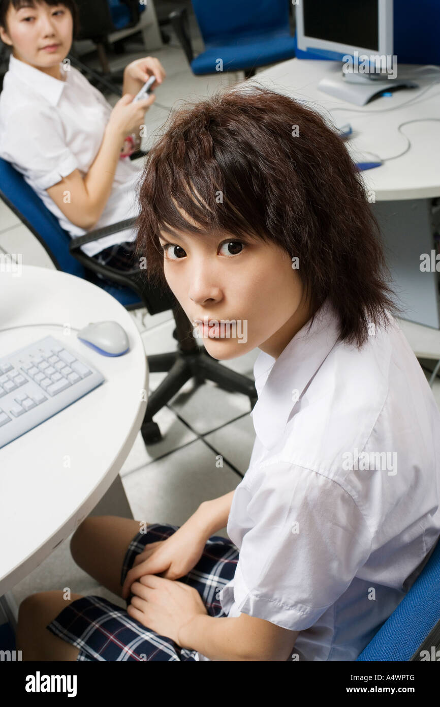 Female student sitting at a computer Stock Photo - Alamy