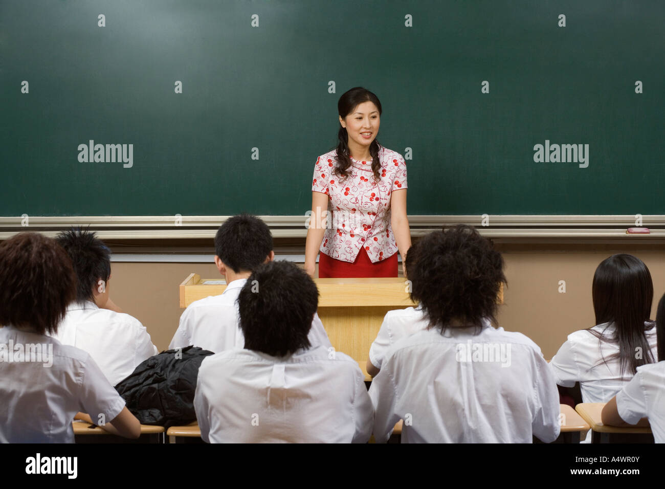 Teacher addressing the class Stock Photo - Alamy