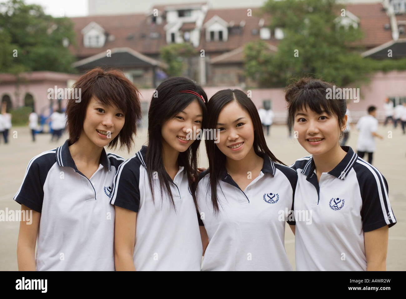 Female students smiling together Stock Photo - Alamy