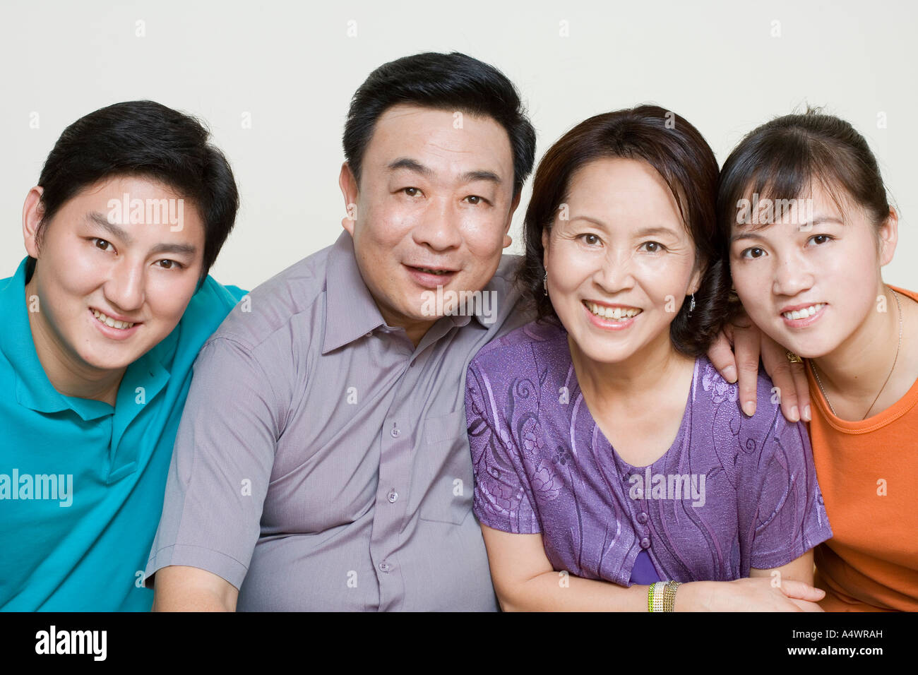 Family smiling together Stock Photo - Alamy