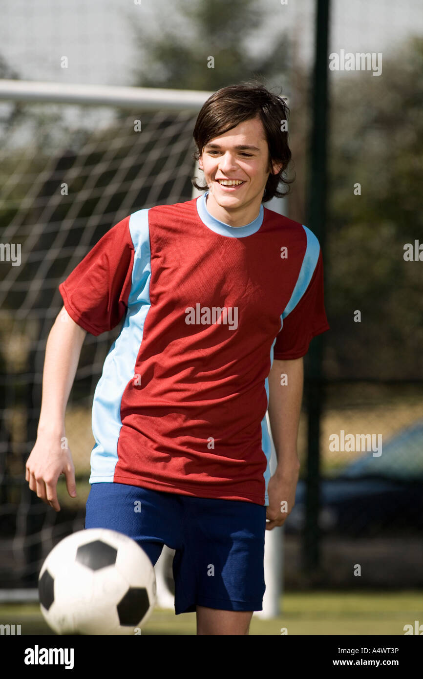 Chasing soccer ball hi-res stock photography and images - Alamy