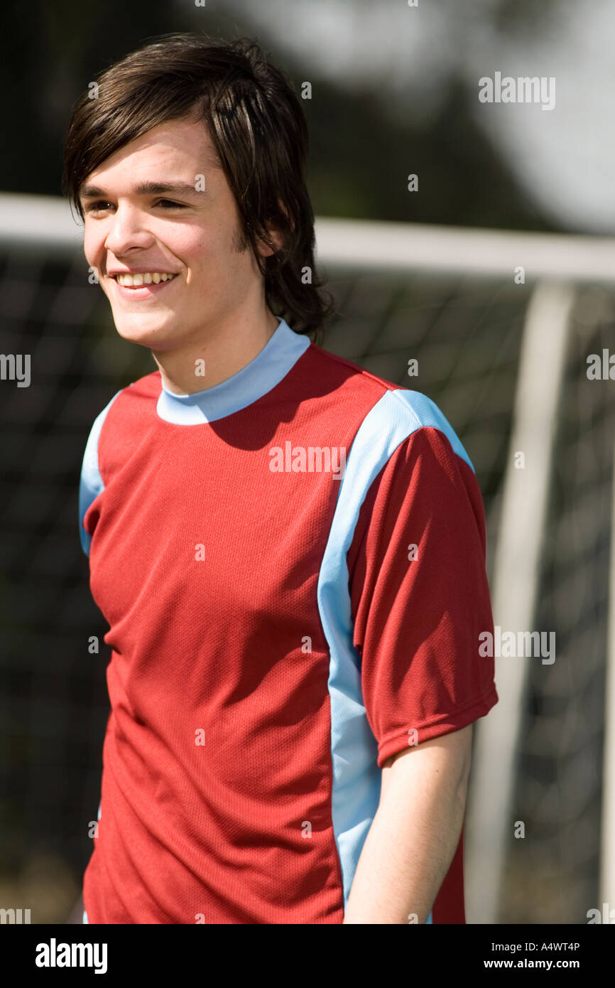 Soccer player smiling Stock Photo - Alamy