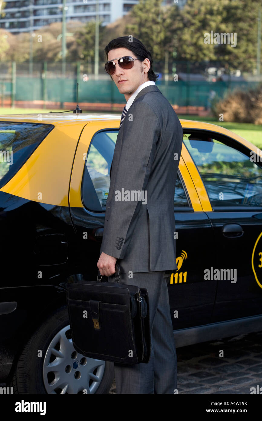 Businessman getting cab hi-res stock photography and images - Alamy