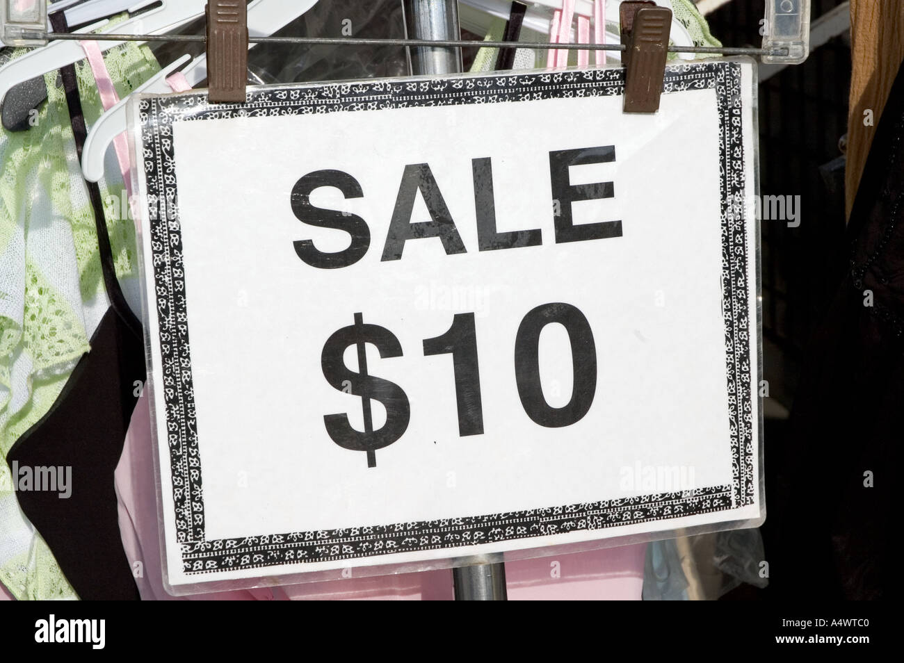 A 'Sale' sign in a shop Stock Photo - Alamy
