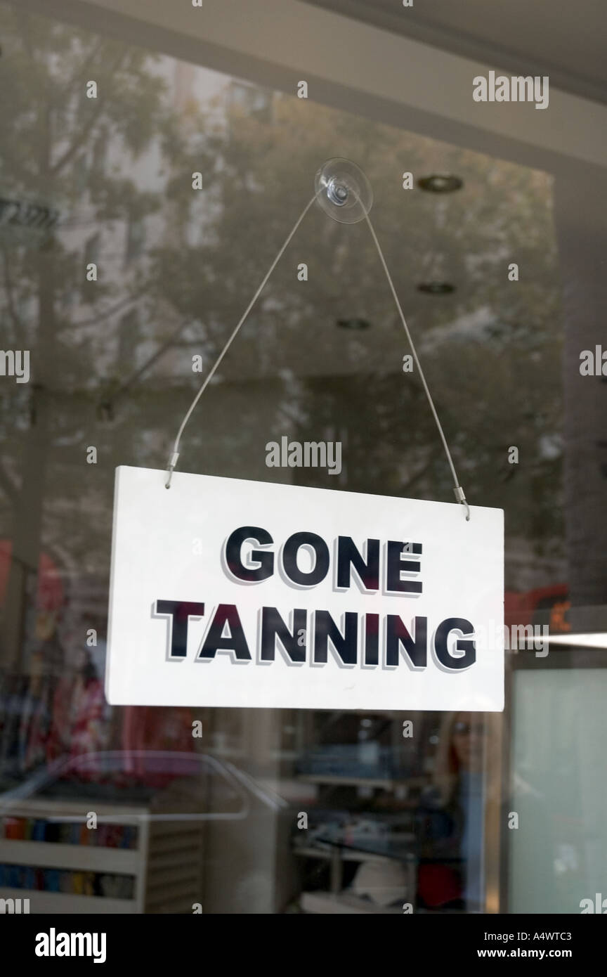 'Gone Tanning' a sign on the door of a shop in Los Angeles Stock Photo ...