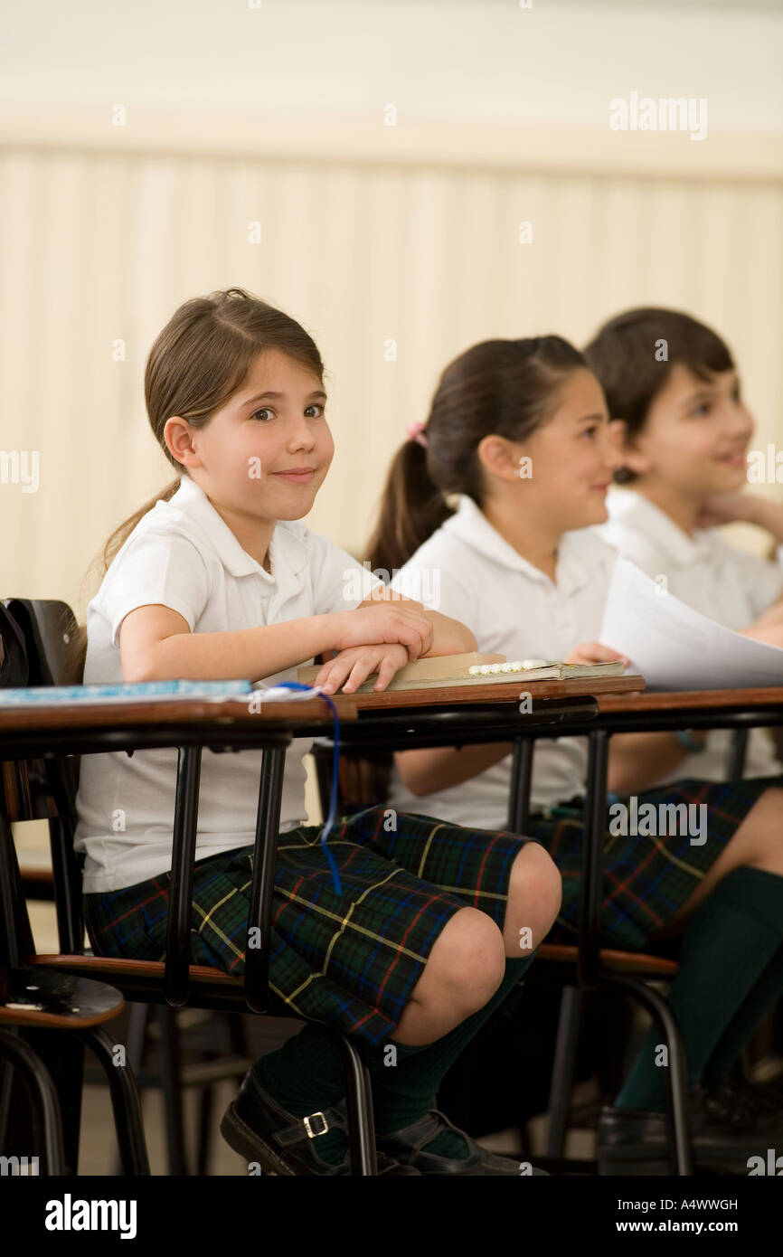 Young students sitting in class Stock Photo - Alamy