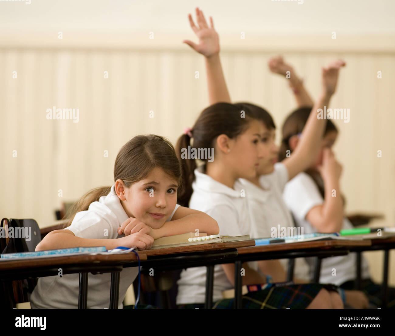 Young students sitting in class Stock Photo - Alamy