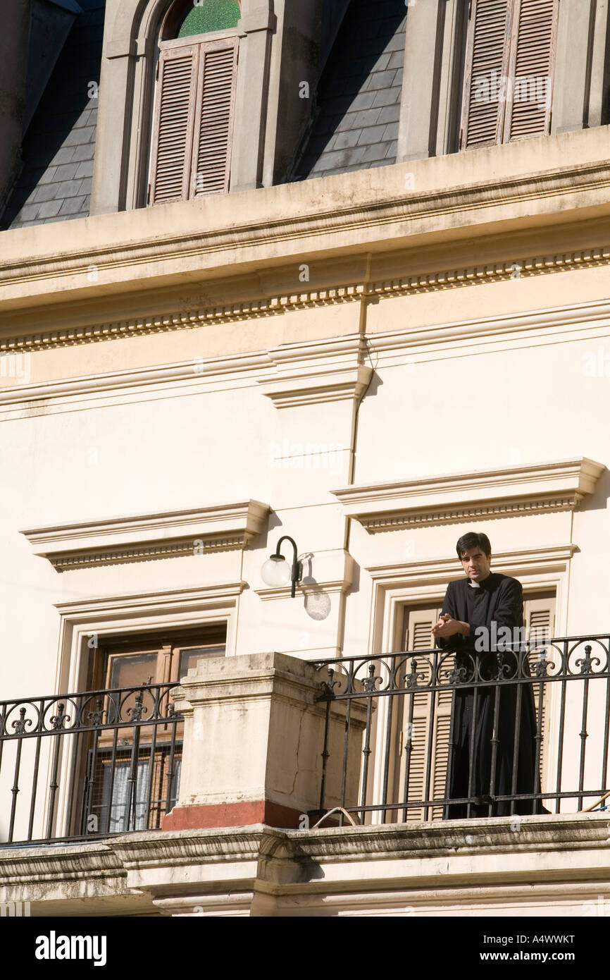 Man overlooking scenery from balcony of ornate building Stock Photo - Alamy