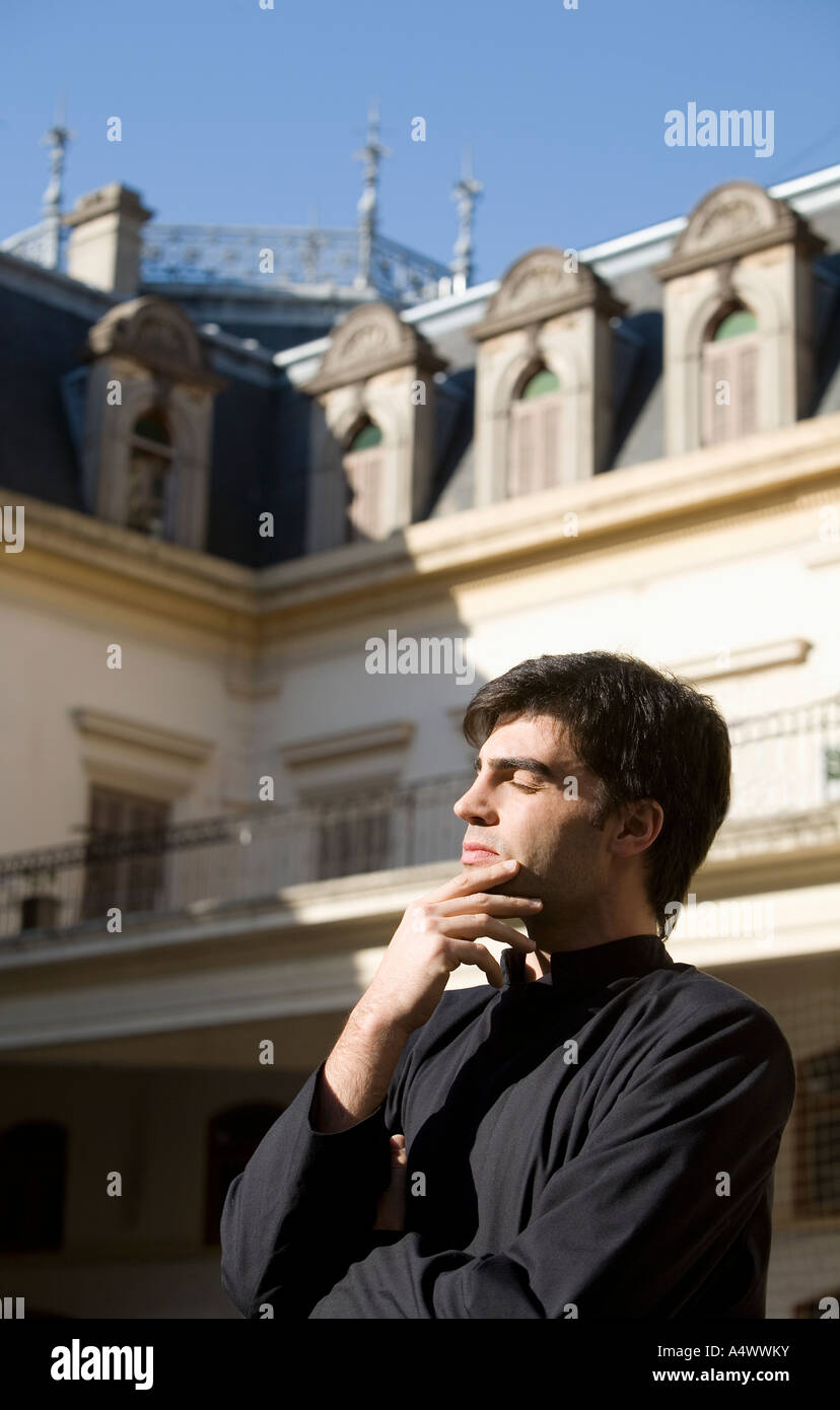 Latin american man praying closed hi-res stock photography and images ...