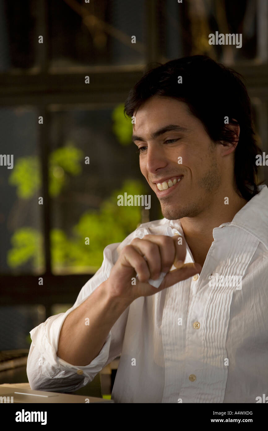 Man crumpling paper Stock Photo - Alamy