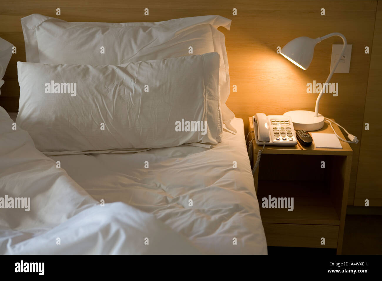 Beside table in hotel room Stock Photo - Alamy