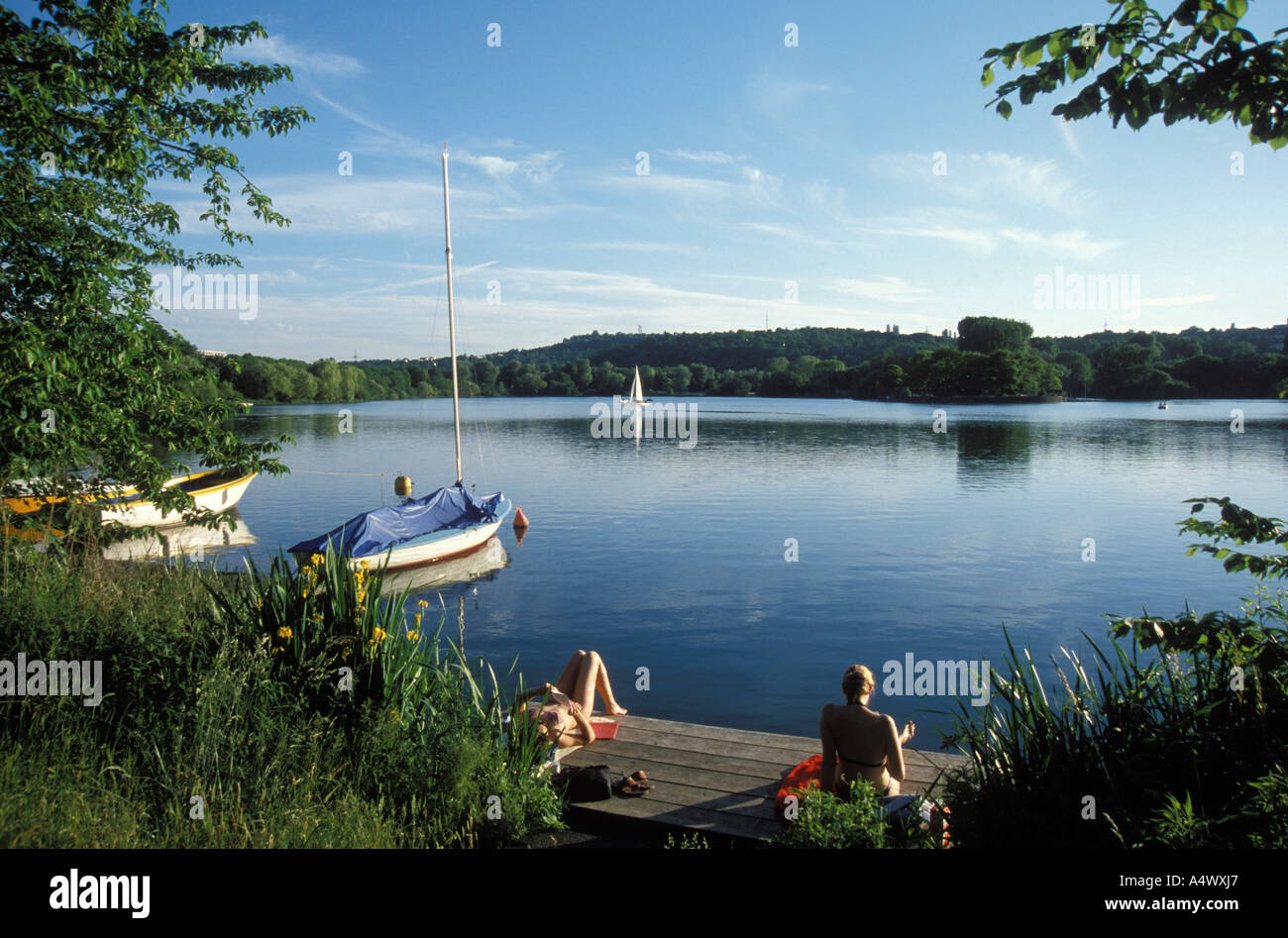 Two women sunbathing at the lake Max Eyth See Stuttgart Baden ...