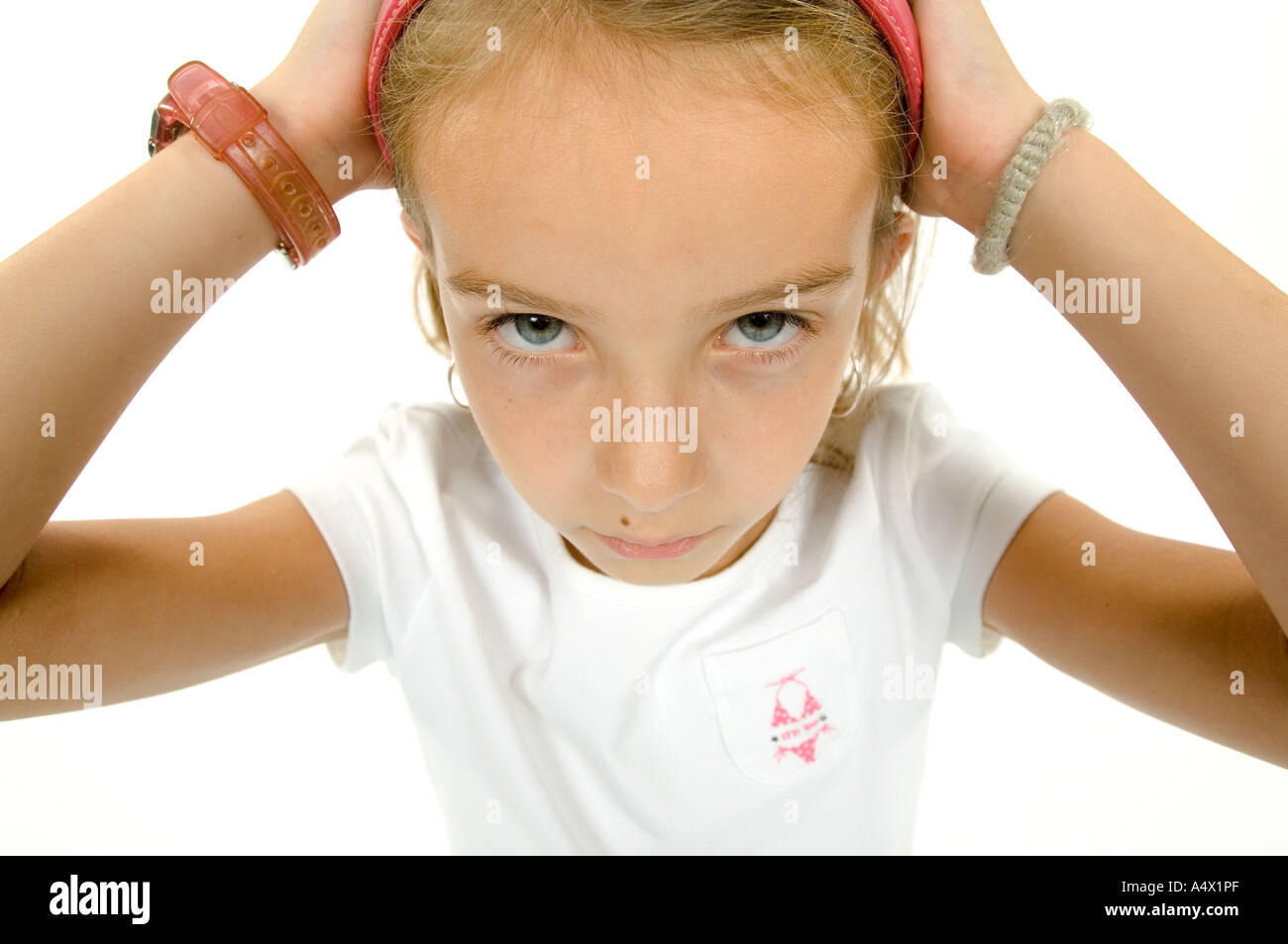 YOUNG GIRL LOOKING UP INTO CAMERA Stock Photo - Alamy