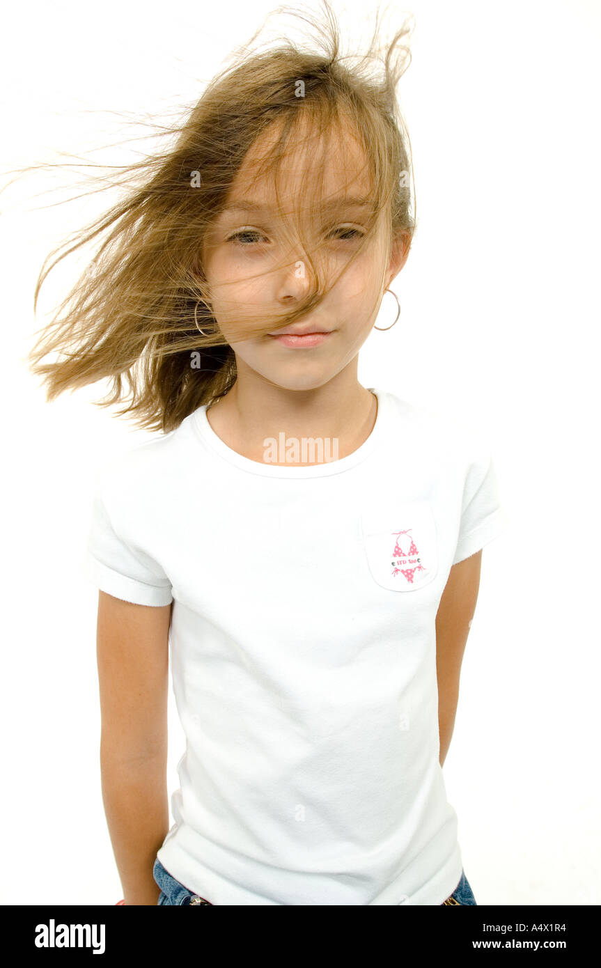YOUNG GIRL WIND BLOWN HAIR Stock Photo - Alamy