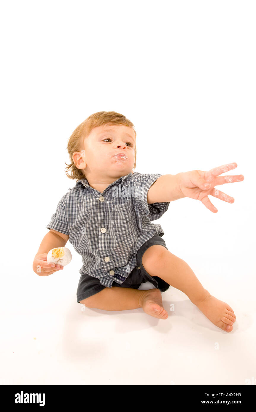 LITTLE BOY REACHING Stock Photo - Alamy