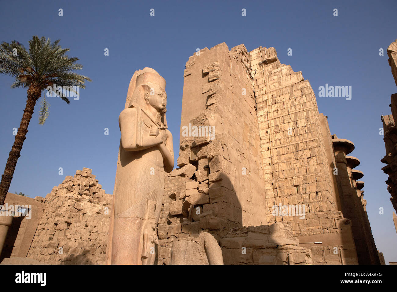 Karnak temple huge statue hi-res stock photography and images - Alamy