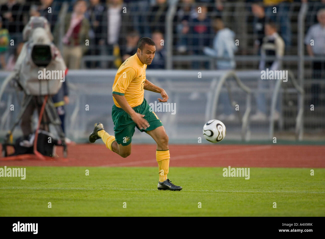 Football player with ball Stock Photo - Alamy