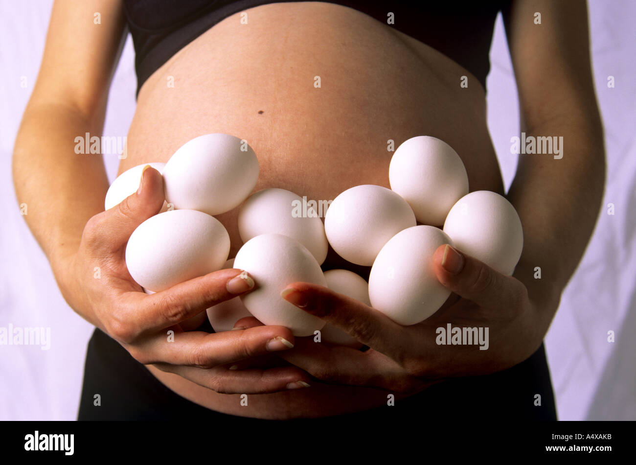 Pregnant belly eggs hi-res stock photography and images - Alamy