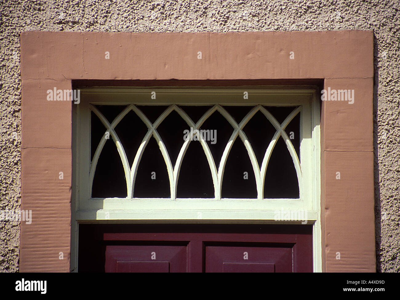 Georgian Gothic Square window light above a doorway Stock Photo - Alamy