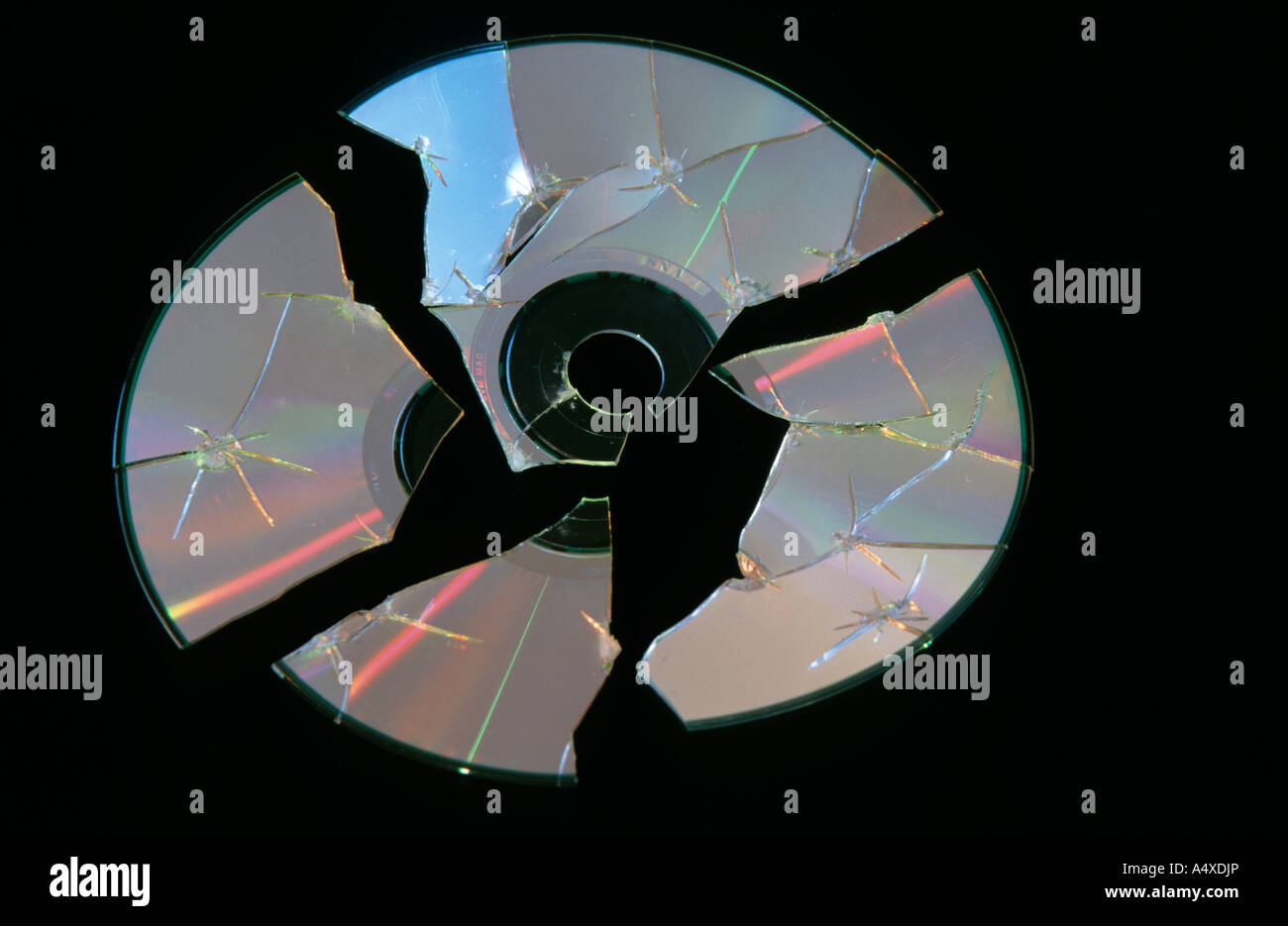 Compact disc smashed into pieces Stock Photo - Alamy