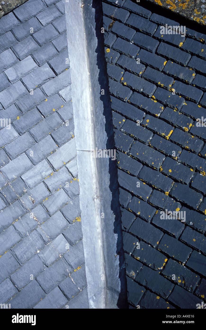 Traditional lead slated valley with rake cutting to slates UK Stock ...