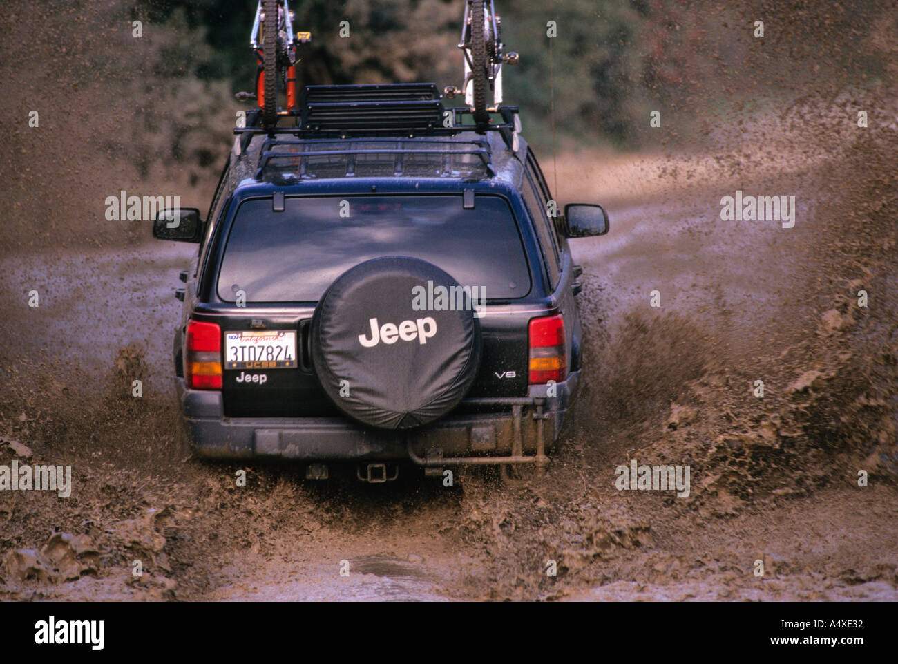 4x4 off road driving in mud Stock Photo - Alamy