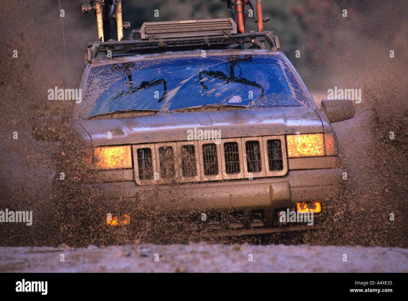 4x4 off road driving in mud Stock Photo - Alamy