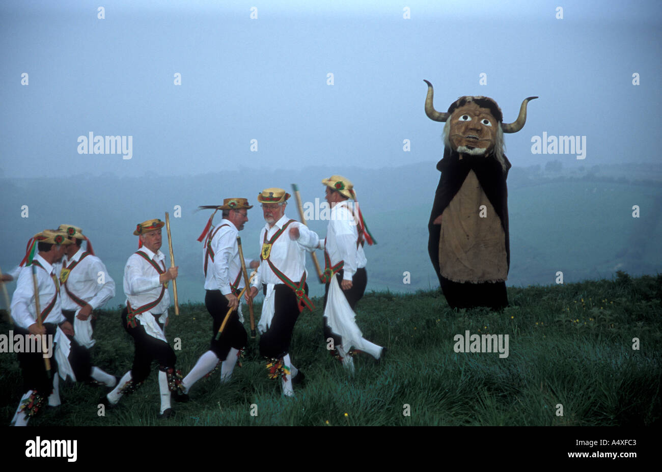 PAGAN festivals Morris dancers at the top of the Cerne Abbey in Dorset ...