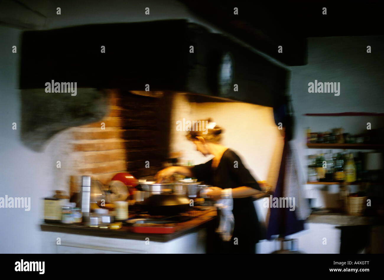 France Provence Woman Cooking In The Kitchen Stock Photo - Alamy