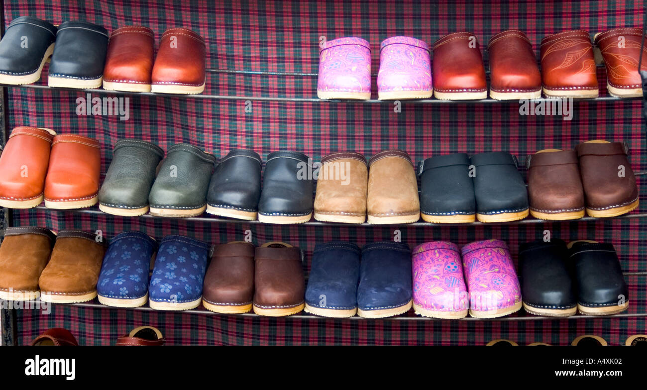 Pairs of coloured clogs at market stall Stock Photo - Alamy