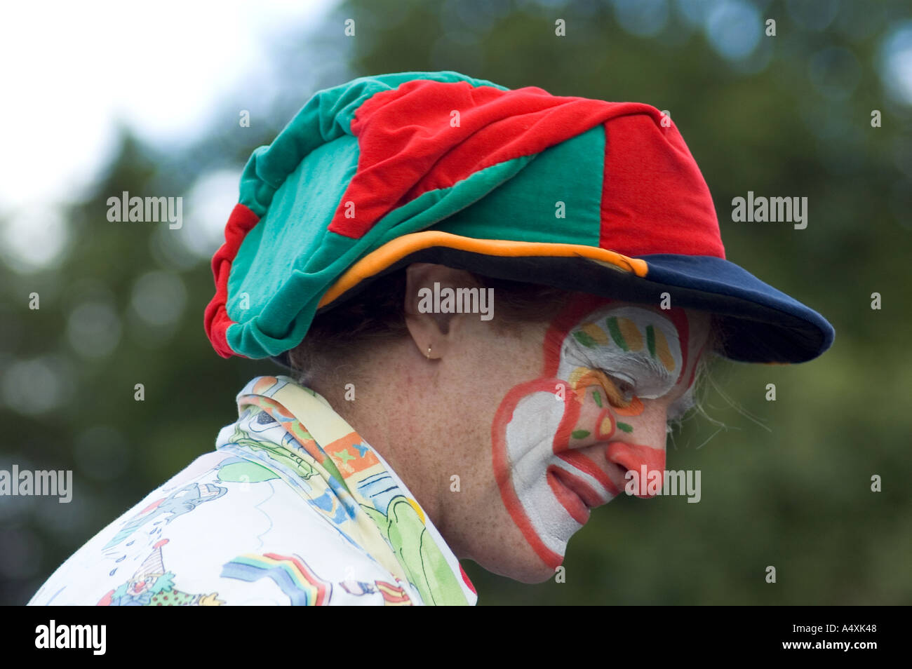 Clown with red painted nose Stock Photo - Alamy
