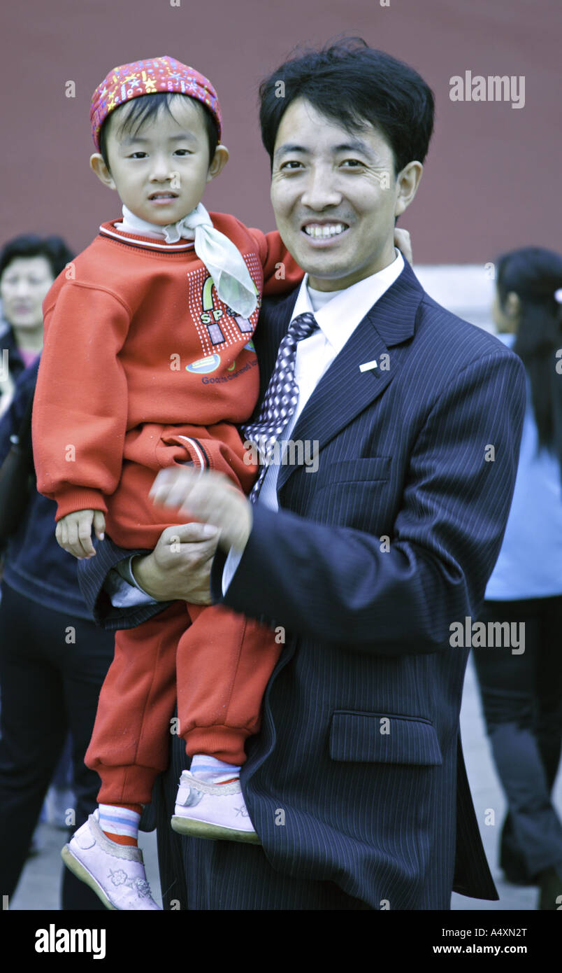 CHINA BEIJING Proud Chinese father poses for a photo with his son at ...