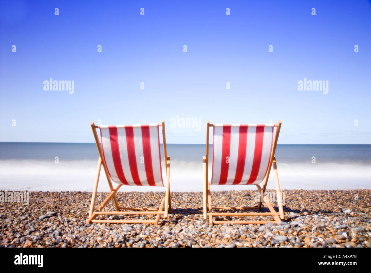 Deckchairs on beach at Salthouse North Norfolk England UK Stock Photo ...