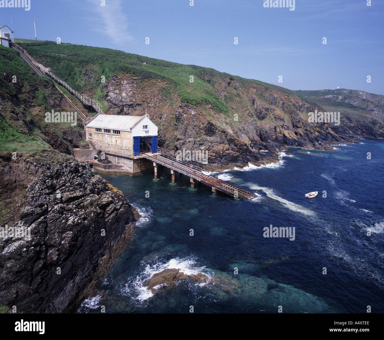 The Lifeboat Station on the Lizard at the foot of a cliff Stock Photo ...