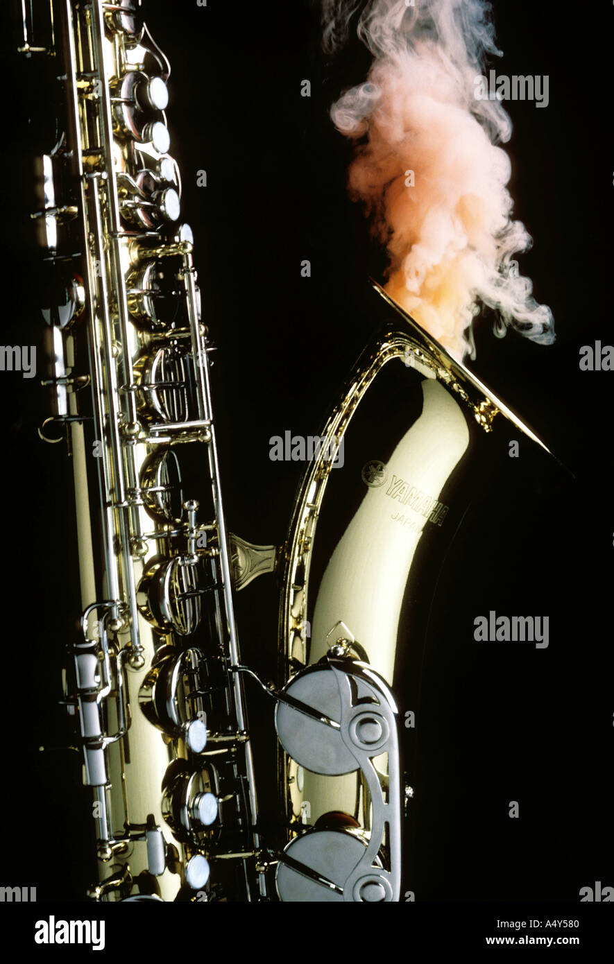 Saxophone with smoke Stock Photo - Alamy