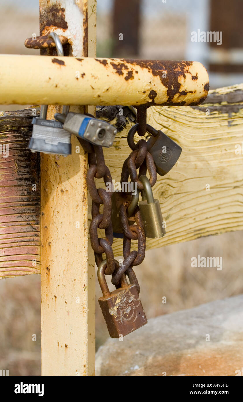 Multiple locks and chain on rusty gate Stock Photo - Alamy Multiple locks and chain on rusty gate Stock Photo - Alamy