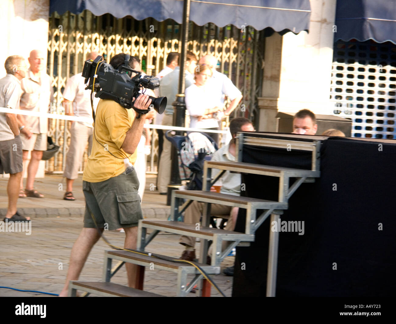 TV Cameraman at work filming outdoors, Gibraltar, Europe Stock Photo ...