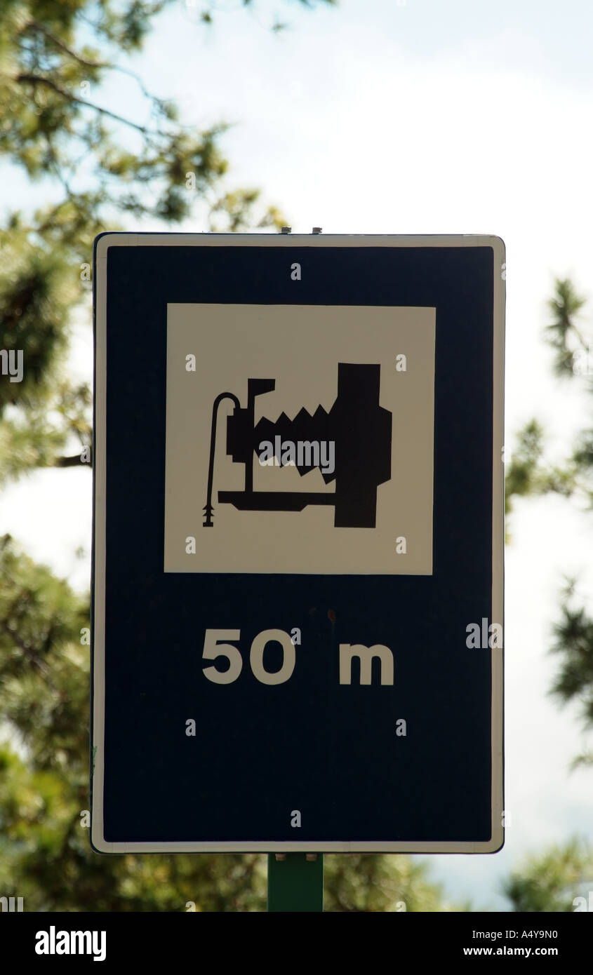 Bellows camera on road sign indicating a excellent viewpoint for taking ...