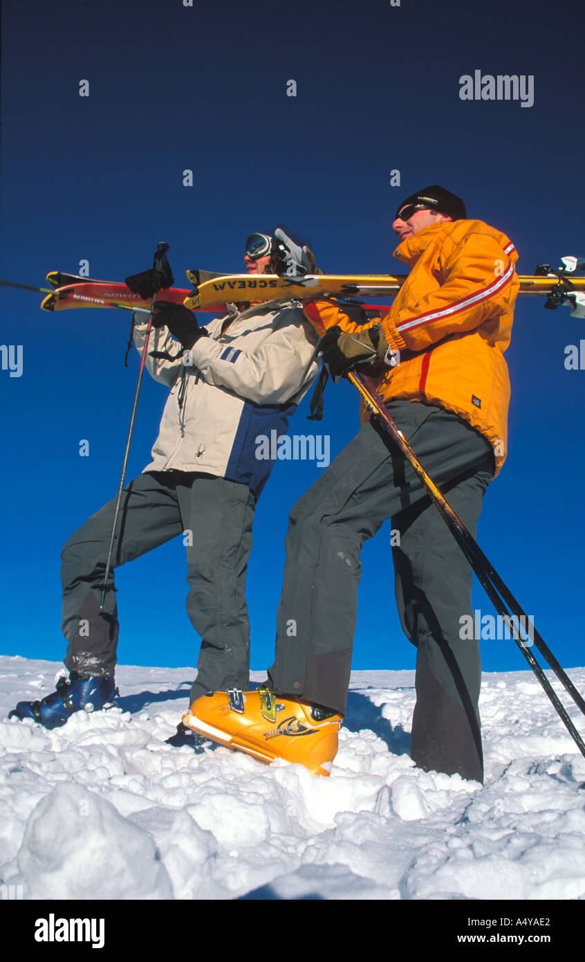 Skiers carrying skis hi-res stock photography and images - Alamy