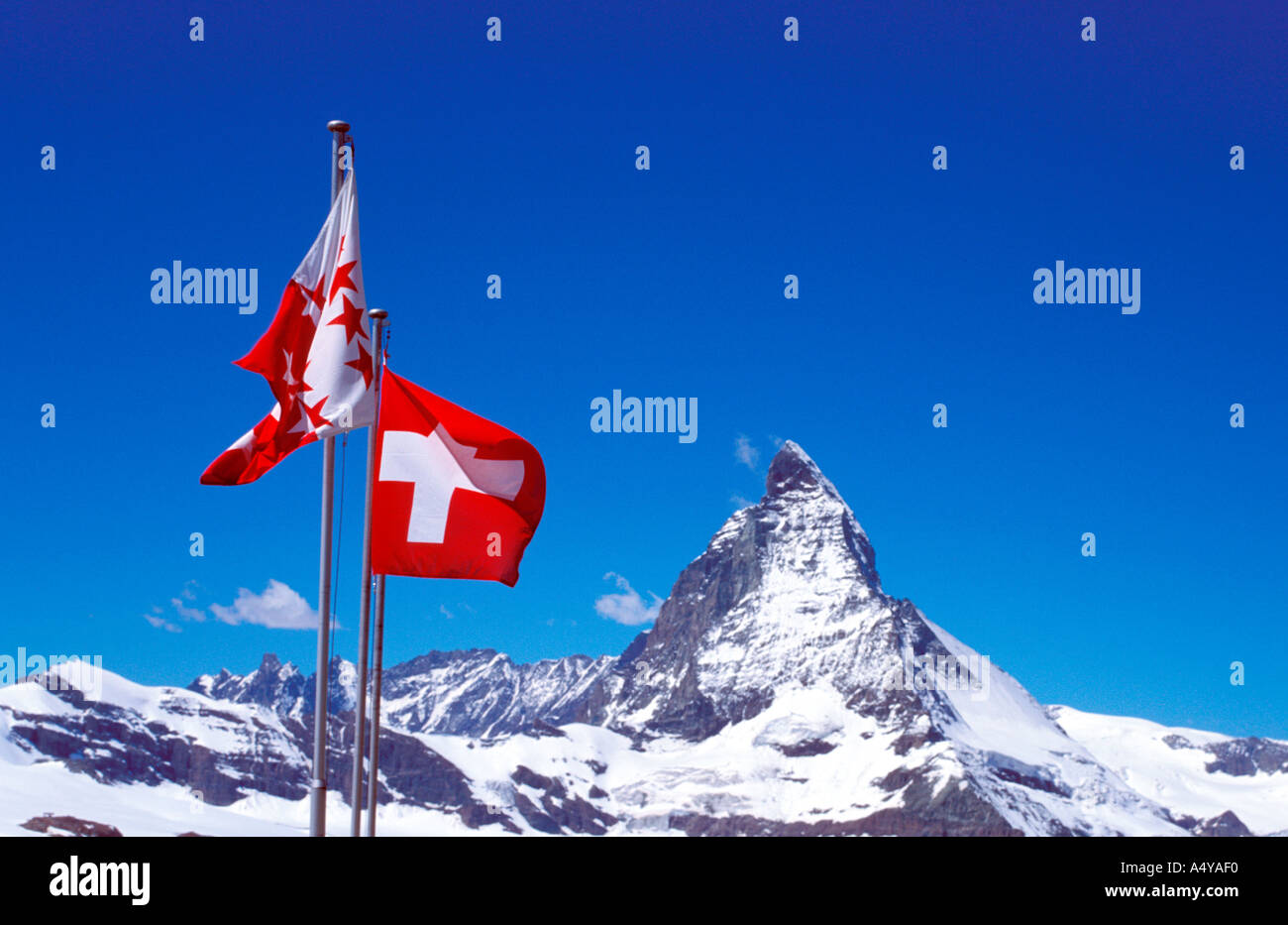 Swiss flag Zermatt Switzerland with the Matterhorn Stock Photo - Alamy