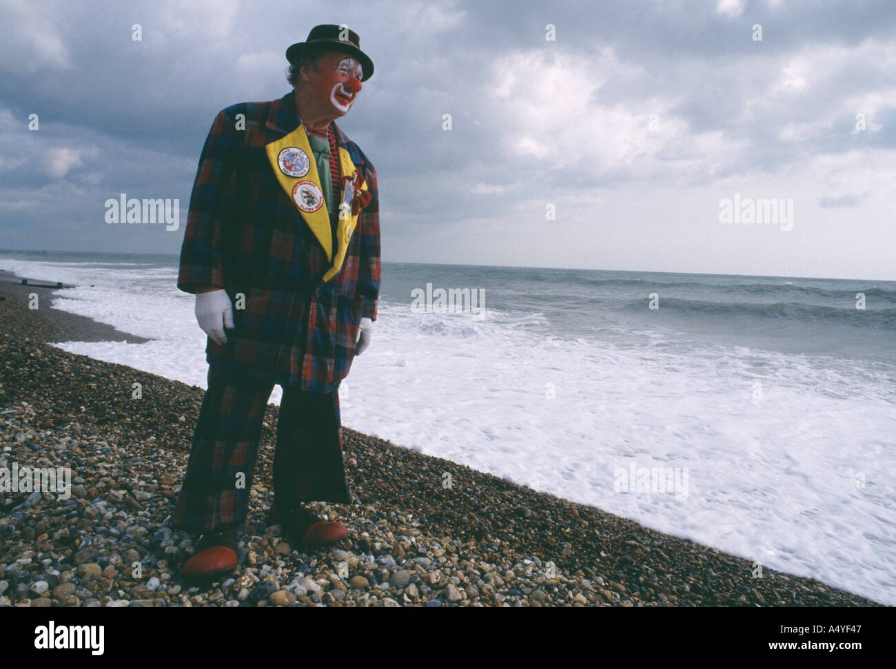 Clown on beach during annual clown convention Bognor Regis England ...