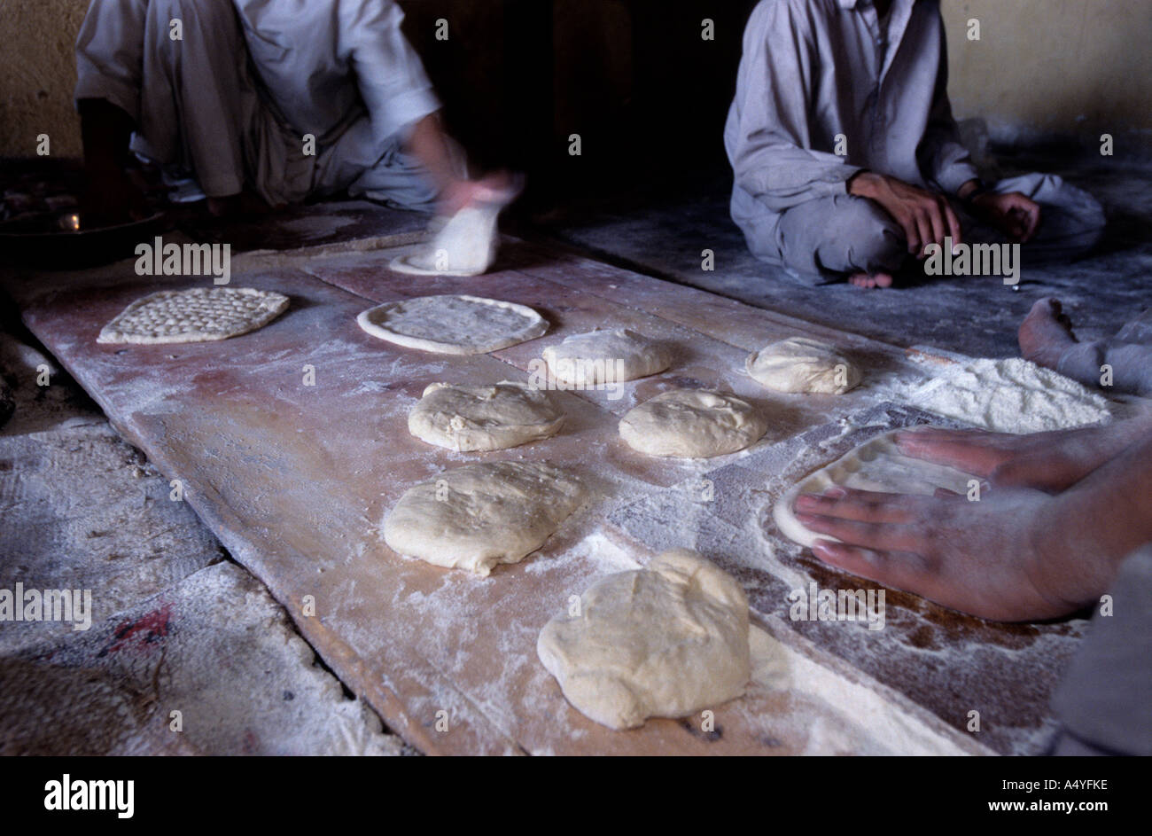 Kabul, Bread bakers at work Stock Photo - Alamy