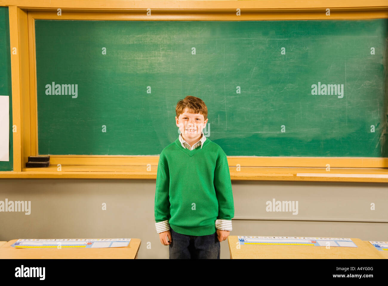 Portrait of boy in classroom Stock Photo - Alamy