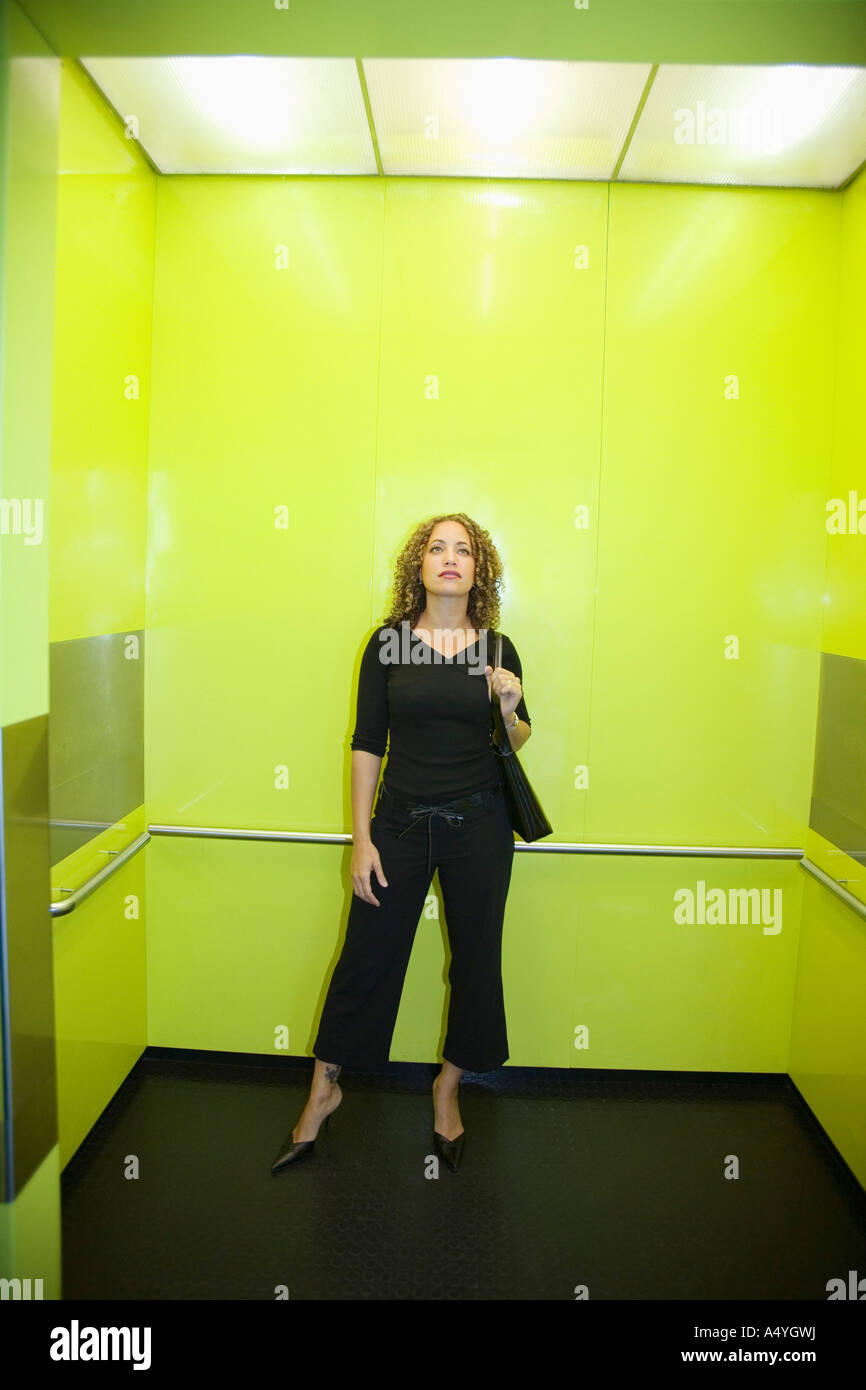 In elevator full body hi-res stock photography and images - Alamy
