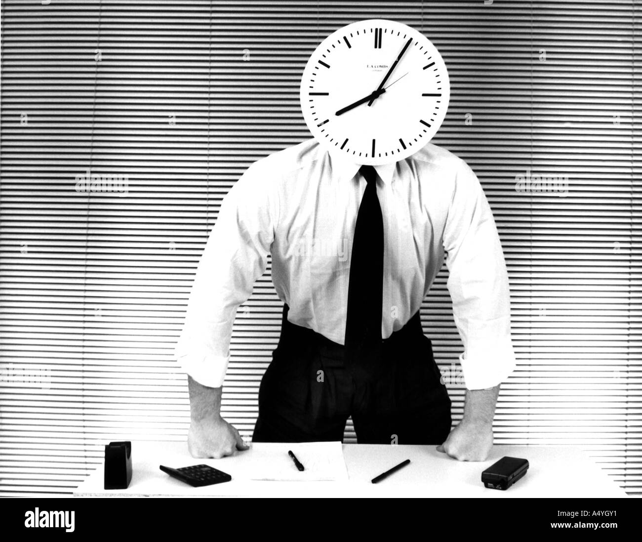 Man clock instead head hi-res stock photography and images - Alamy