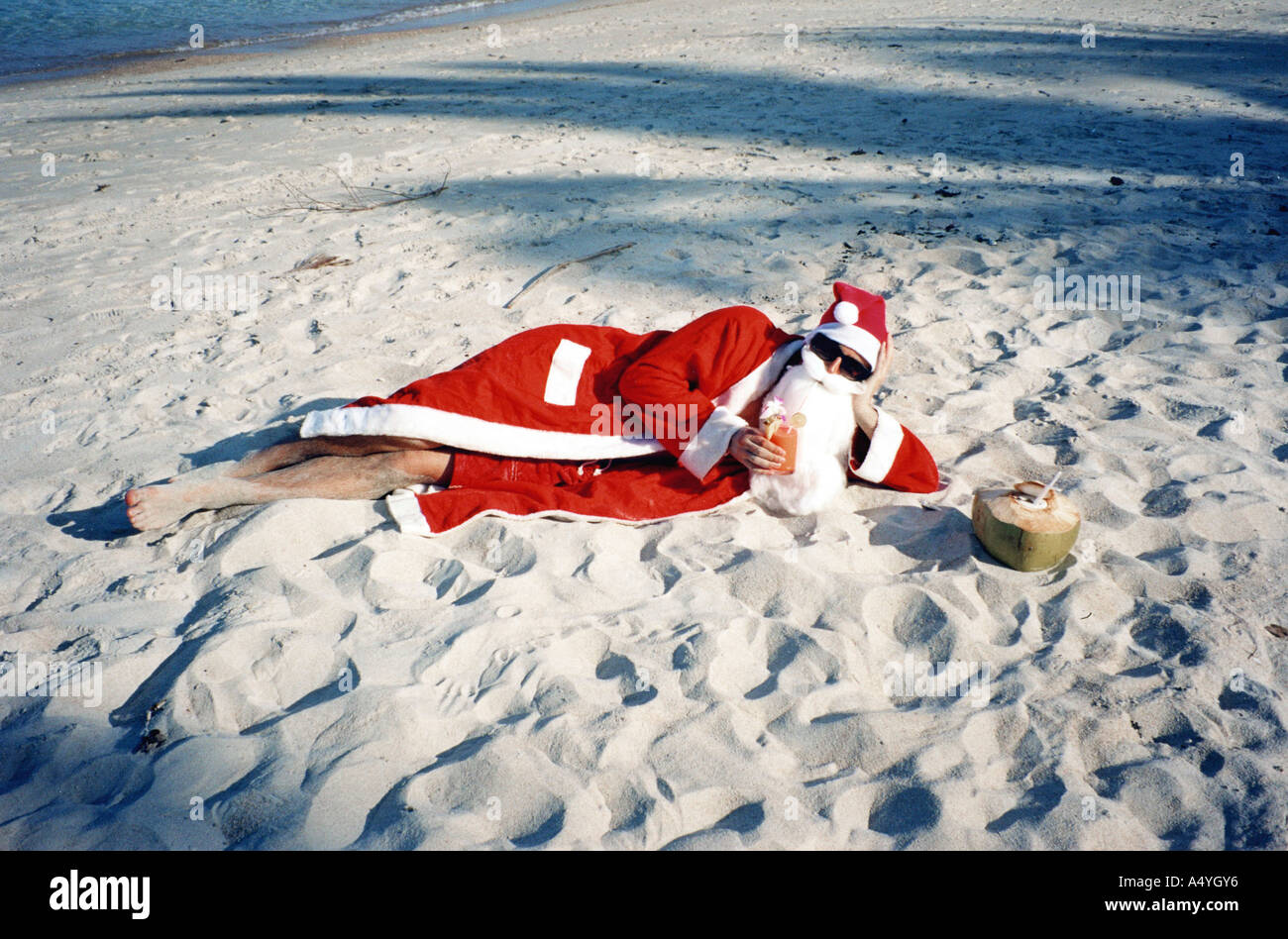 Santa on the beach hi-res stock photography and images - Alamy
